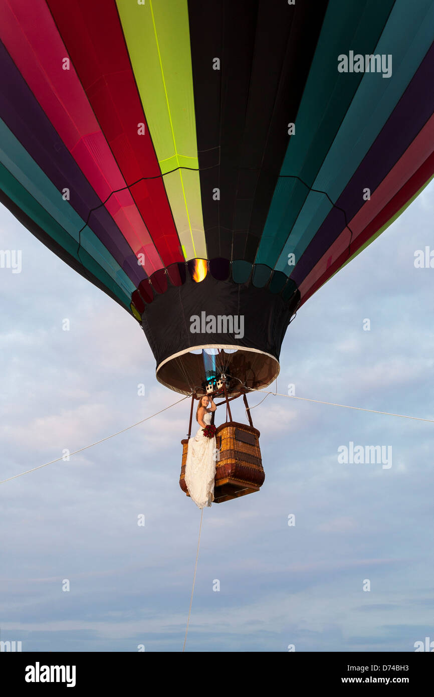 Bride in a wedding dress in a hot air balloon Stock Photo - Alamy