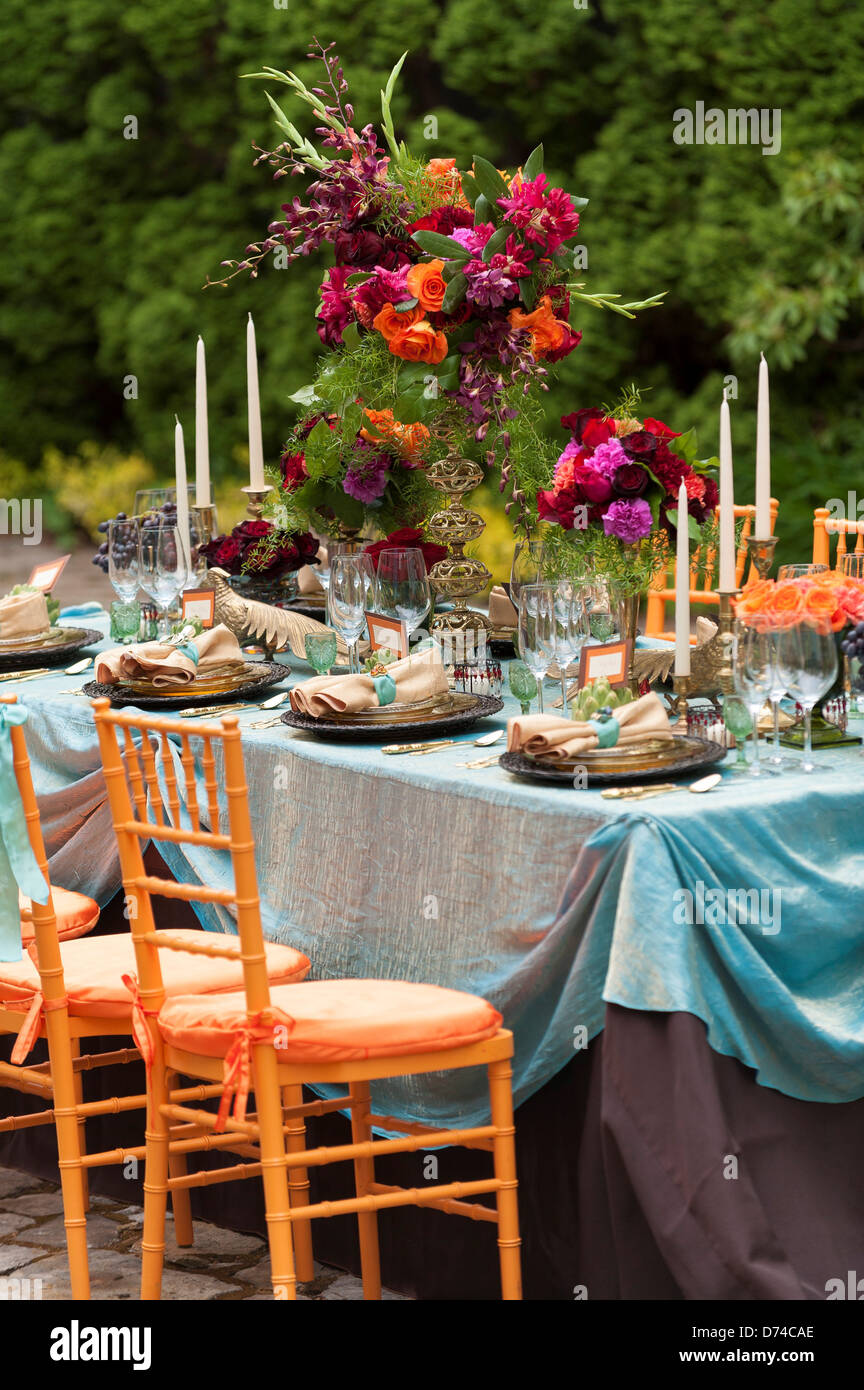 Fancy outdoor event table and plate setting with various flowers Stock ...