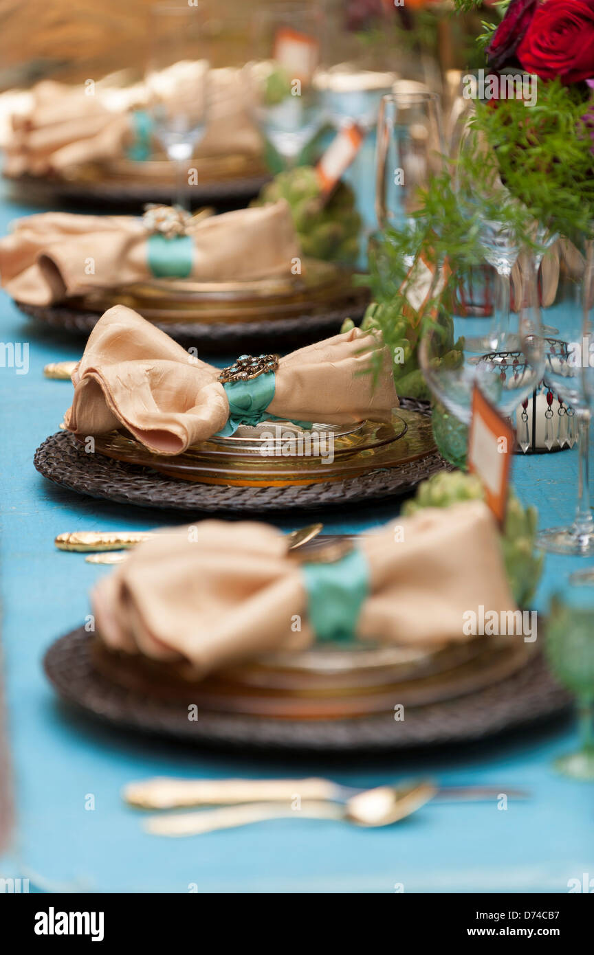 Fancy outdoor event table and plate setting Stock Photo - Alamy