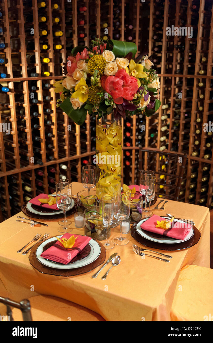 Fancy dinner setting for an event in a wine cellar Stock Photo - Alamy
