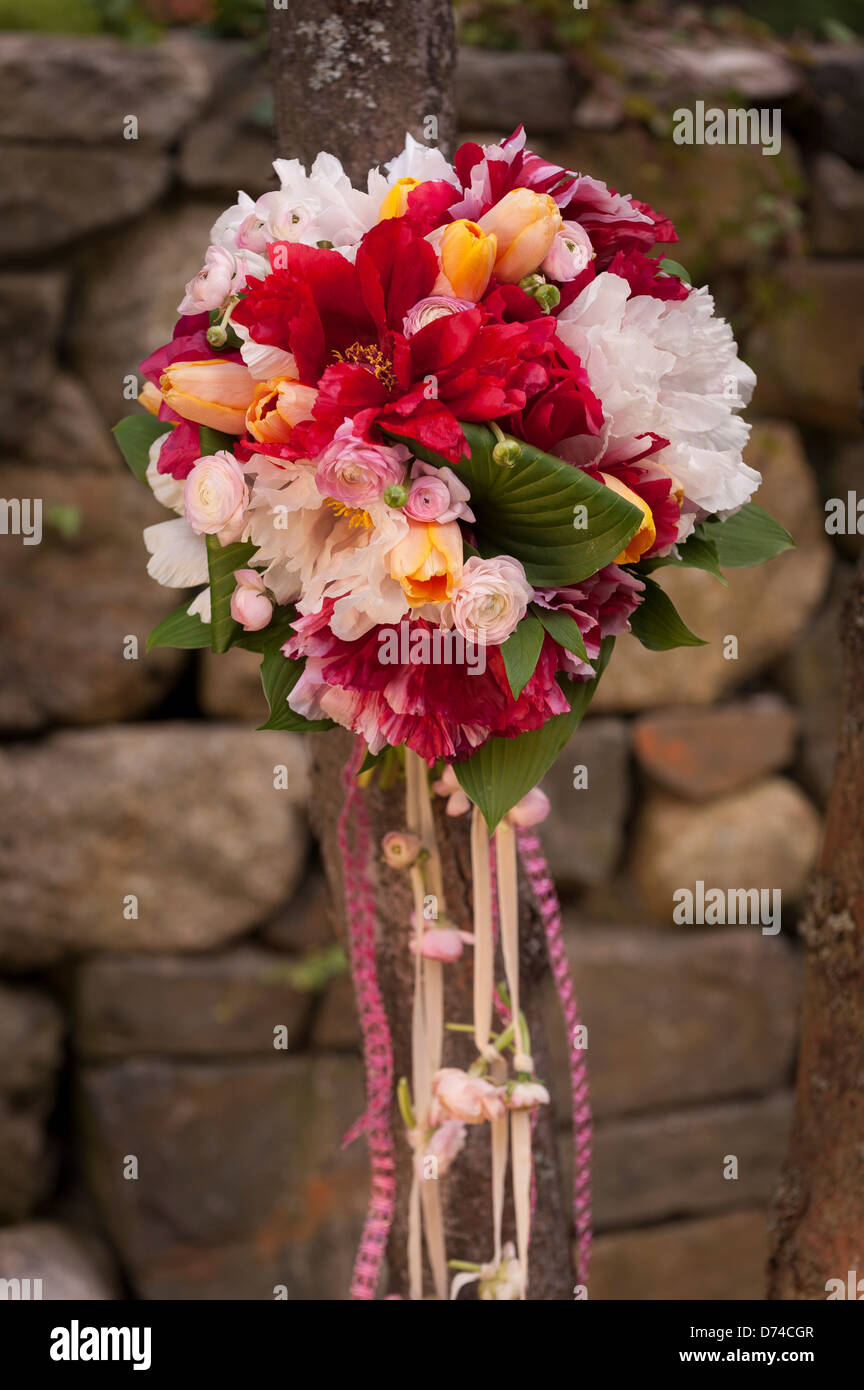 Colorful floral bouquet on a tree Stock Photo - Alamy