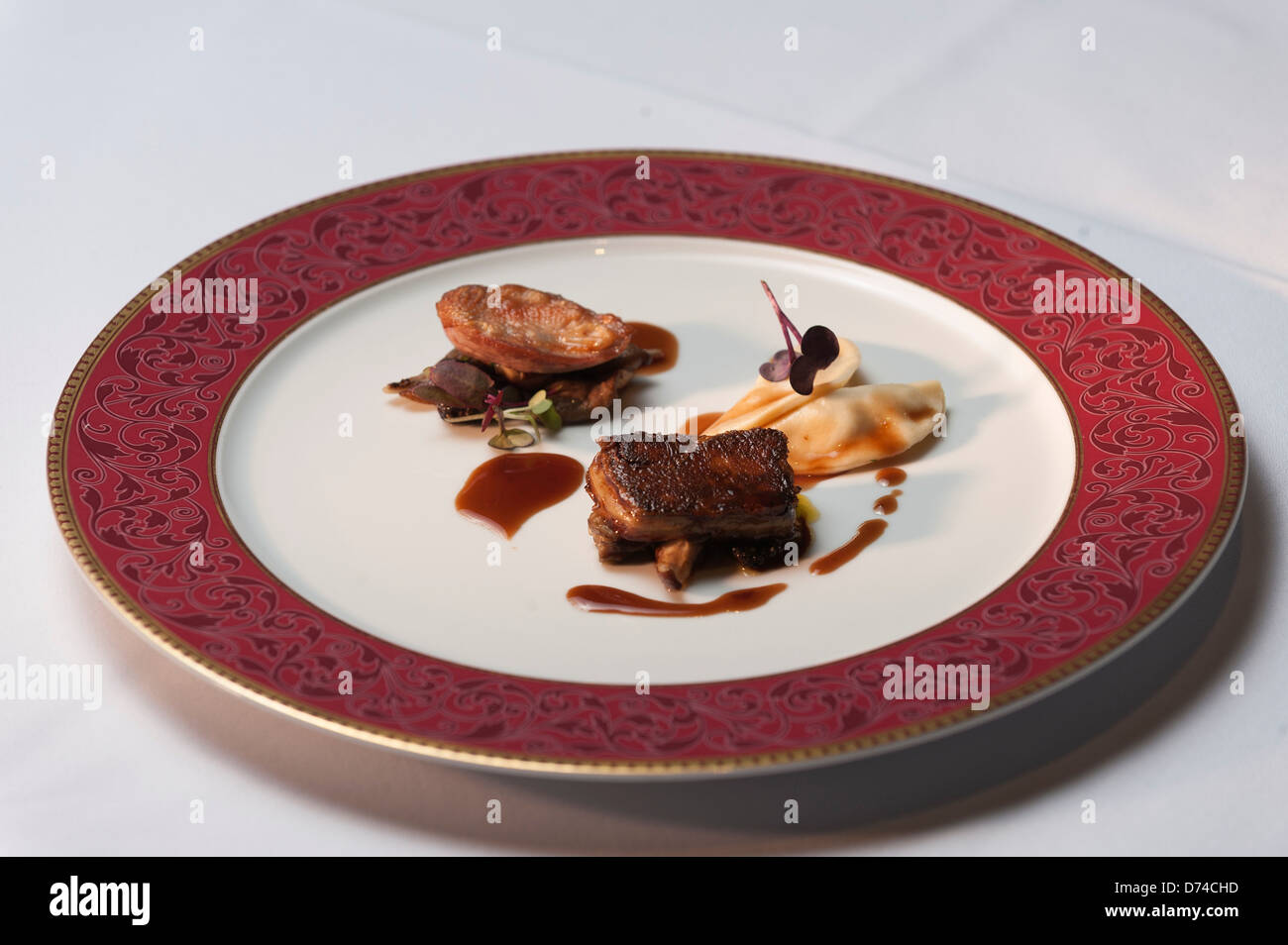 Fancy dinner on a plate Stock Photo - Alamy
