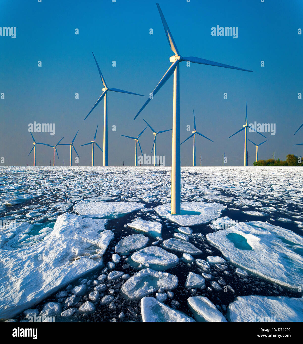 Digitally manipulated image of wind turbine on a cracked ice surface ...