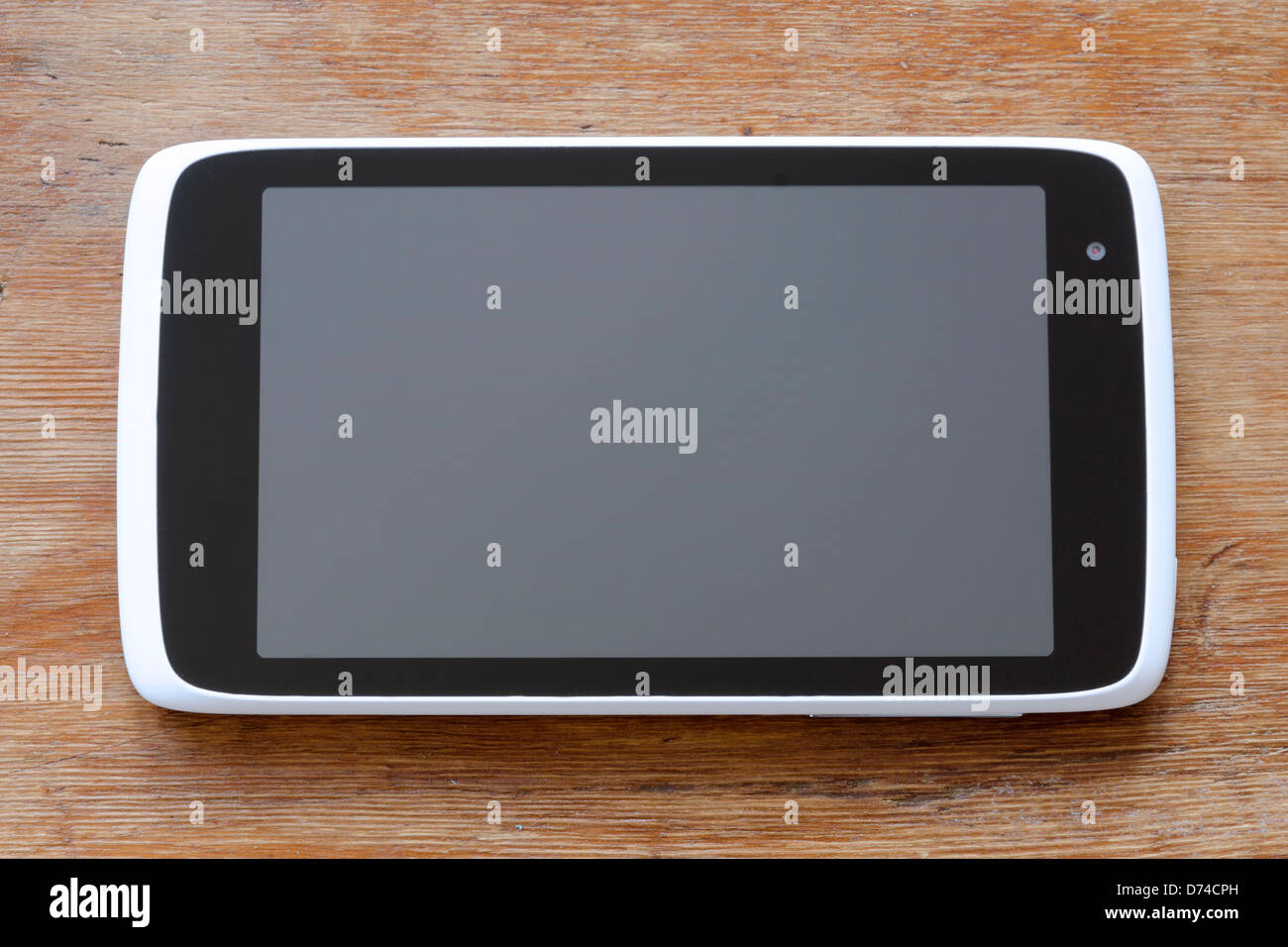 modern tablet pc on vintage wooden background Stock Photo - Alamy