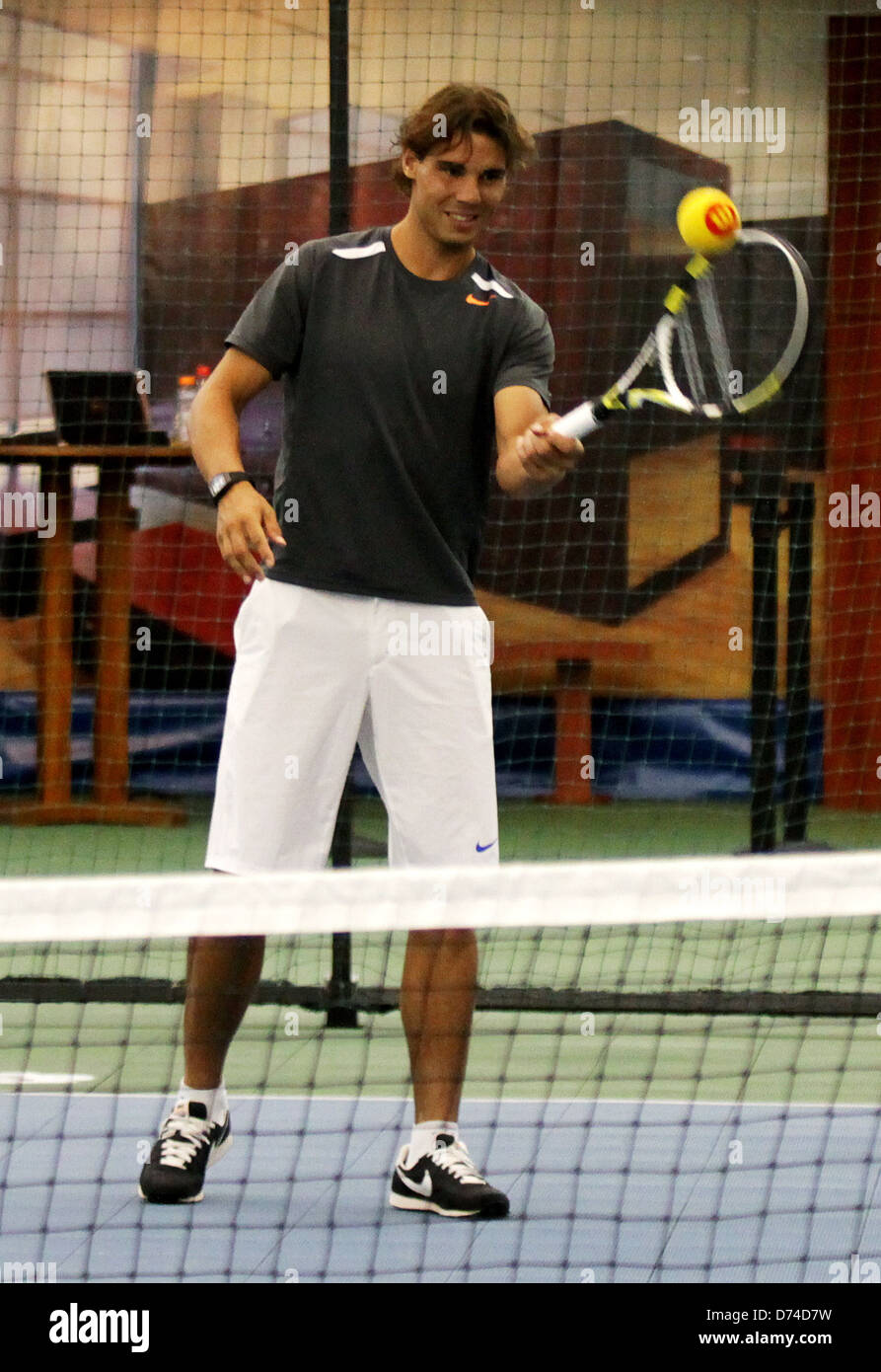 Rafael Nadal participating in a tennis clinic with children from The ...