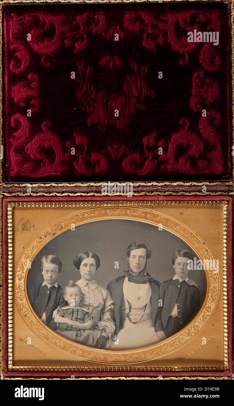 This daguerreotype photograph from 1850 captures a family of five ...