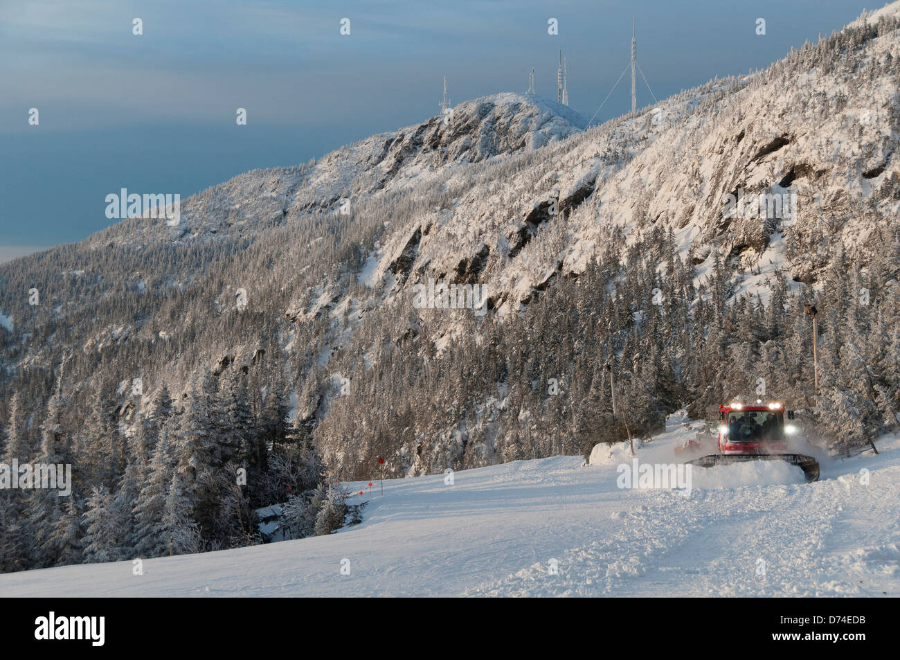 USA, Vermont, Stowe, Snowcat grooming snow in early morning Stock Photo ...