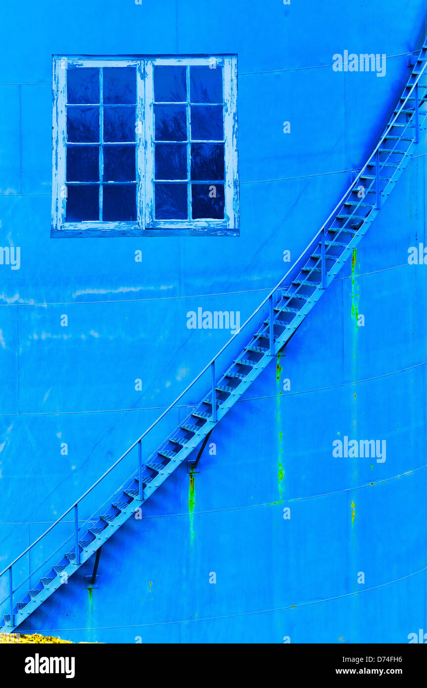 Digitally altered image of stairs winding underneath old window Stock ...