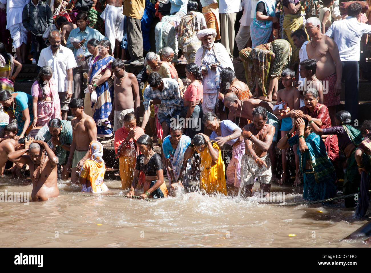 Hindu pilgrims bathing in the sacred water reservoir of Kushavarta (the ...