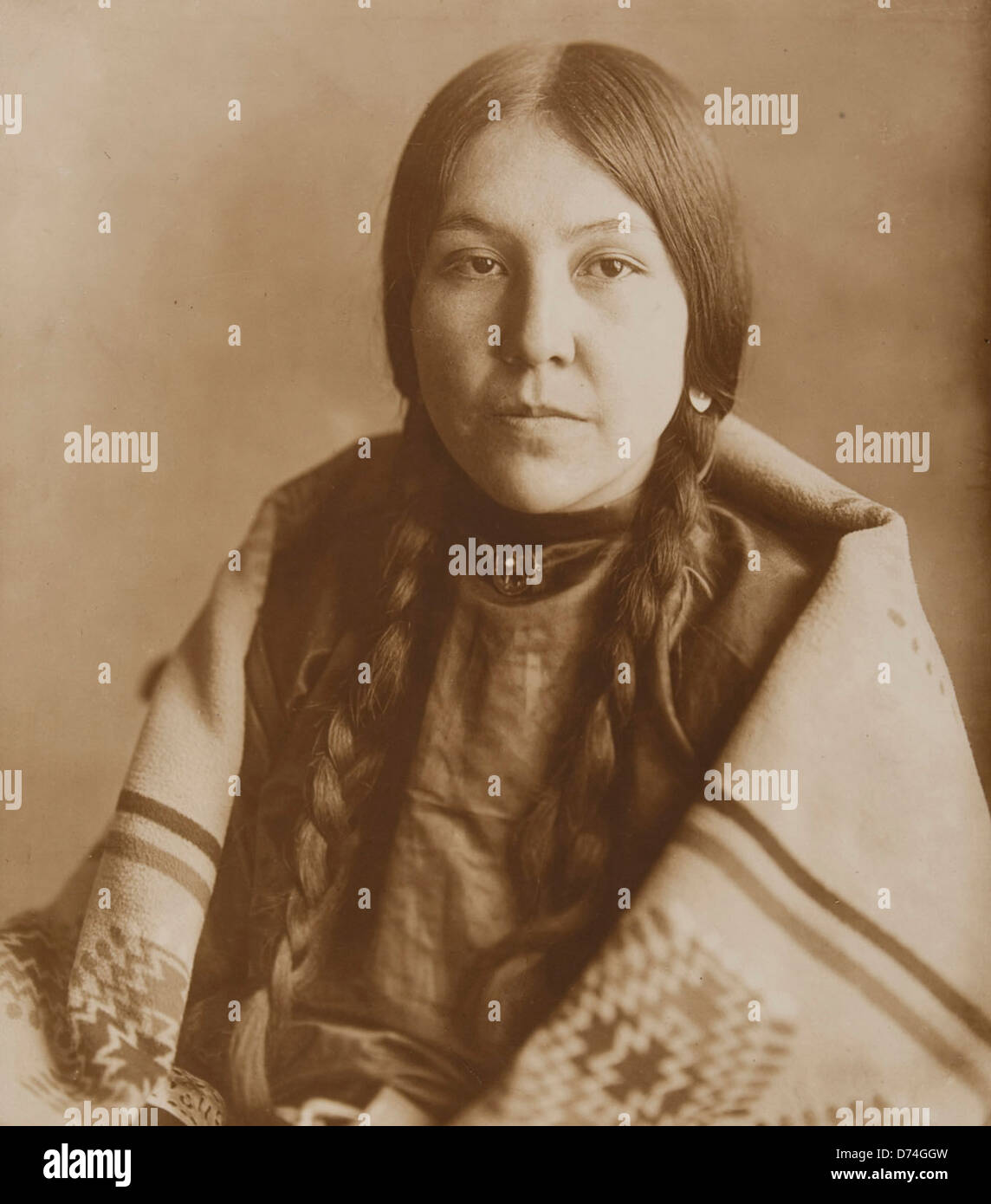This portrait features a Native American woman from the Crow Nation ...
