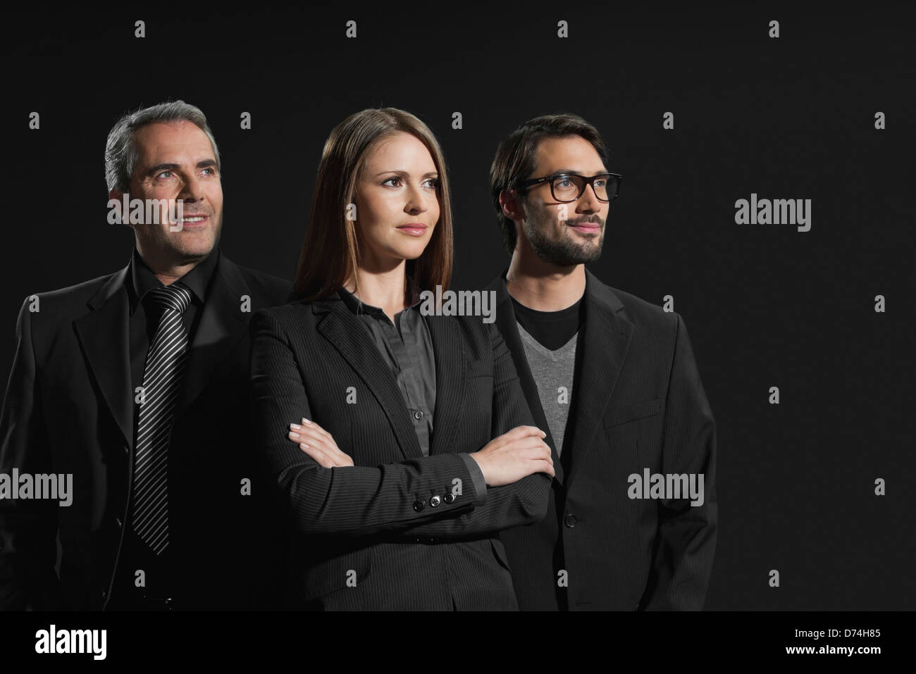 Men and woman against black background Stock Photo - Alamy
