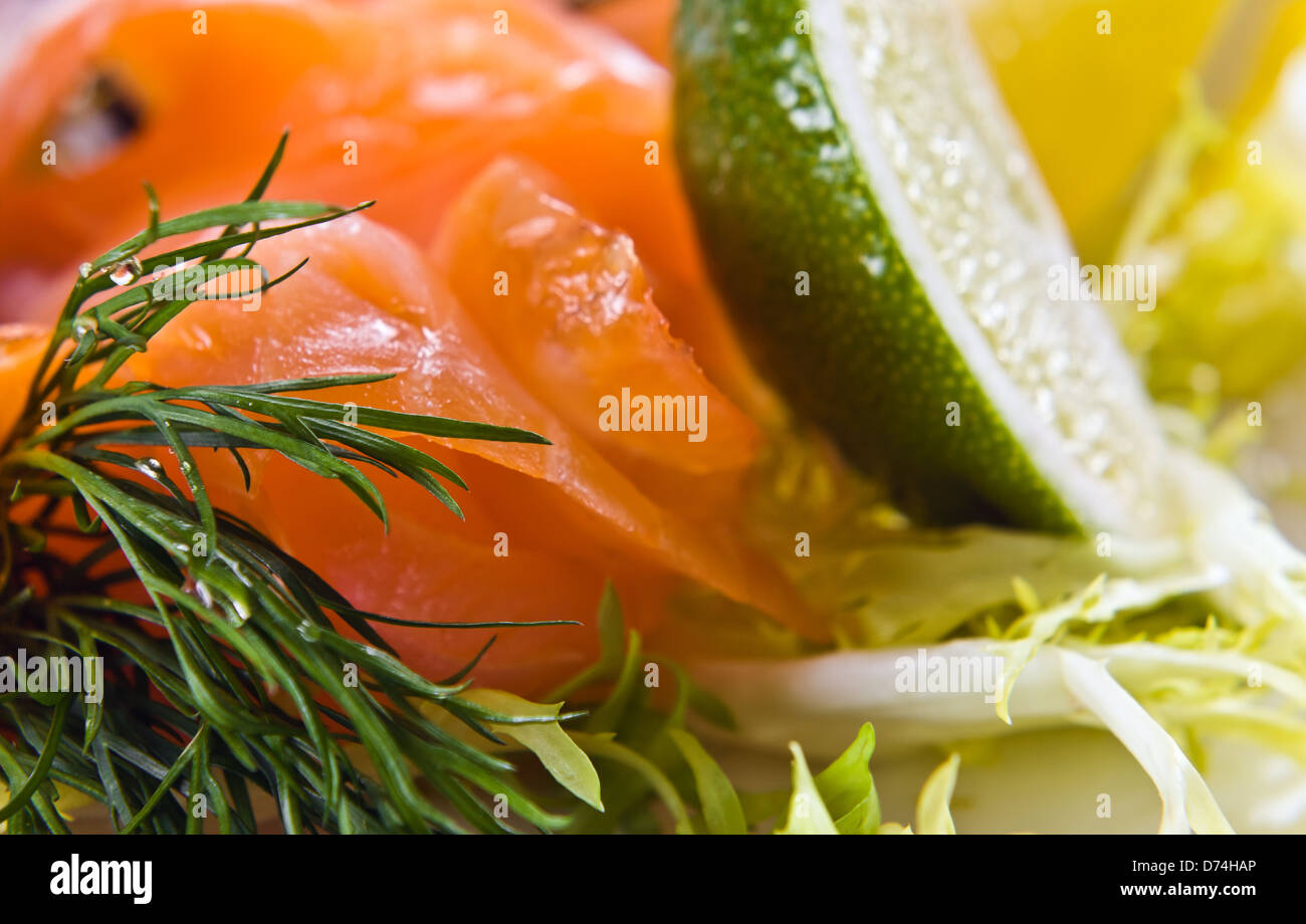 salmon with lime and fennel , focus on a foreground Stock Photo - Alamy