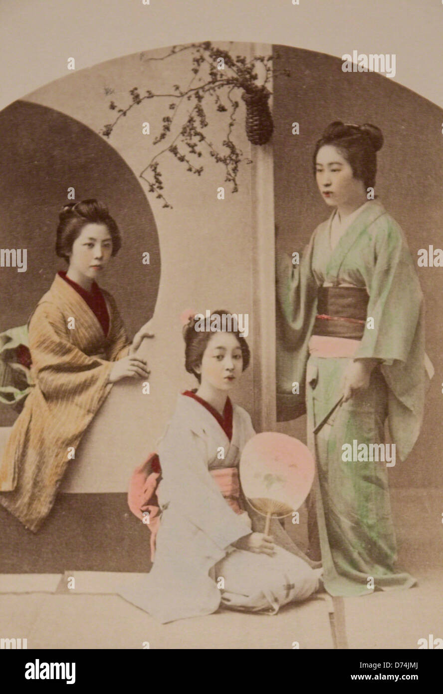 This photograph depicts geishas, or singing girls, capturing a ...