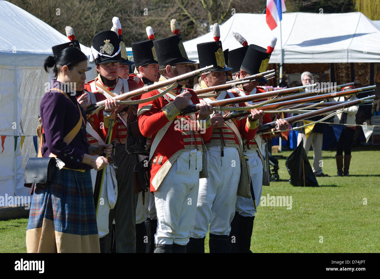 Soldiers firing guns in reenactment Stock Photo - Alamy