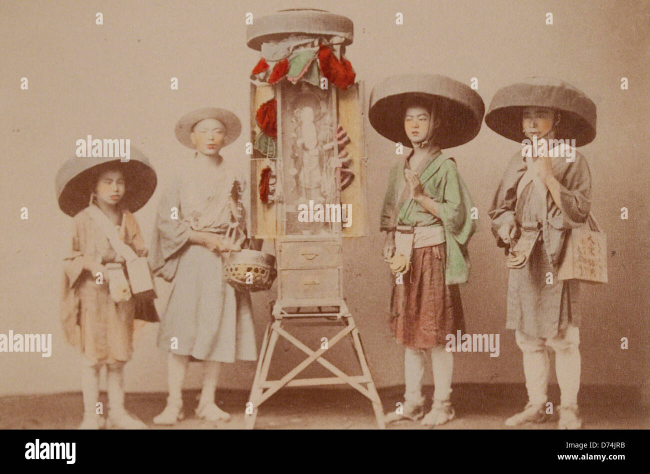 The photograph shows Pilgrim Priests carrying a portable shrine ...