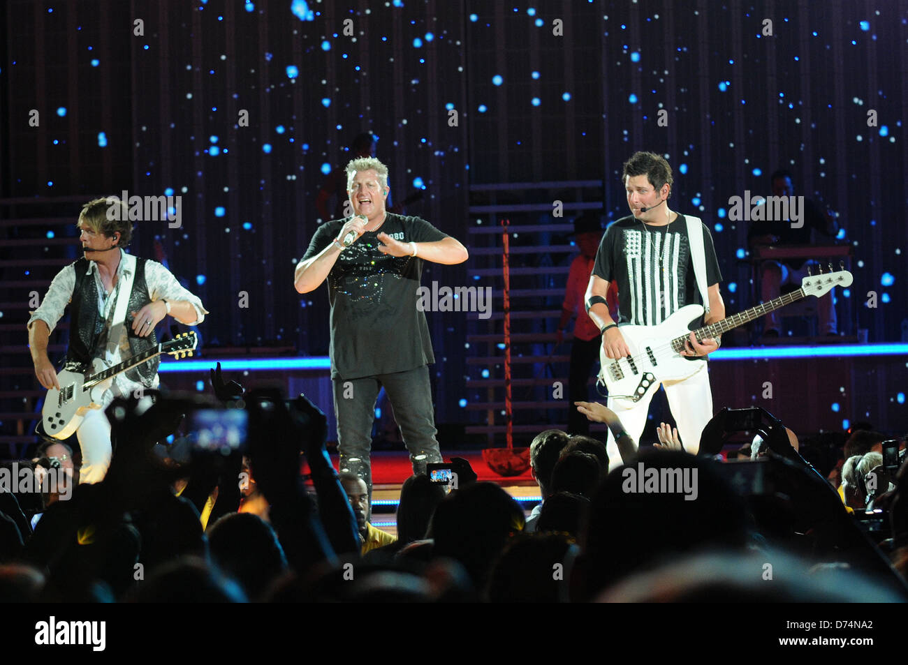 Joe Don Rooney,Gary LeVox,Jay DeMarcus of Rascal Flatts performs at the ...
