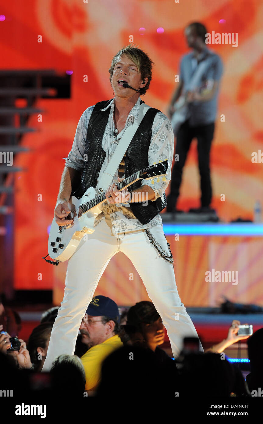 Joe Don Rooney of Rascal Flatts performs at the Cruzan Amphitheater ...