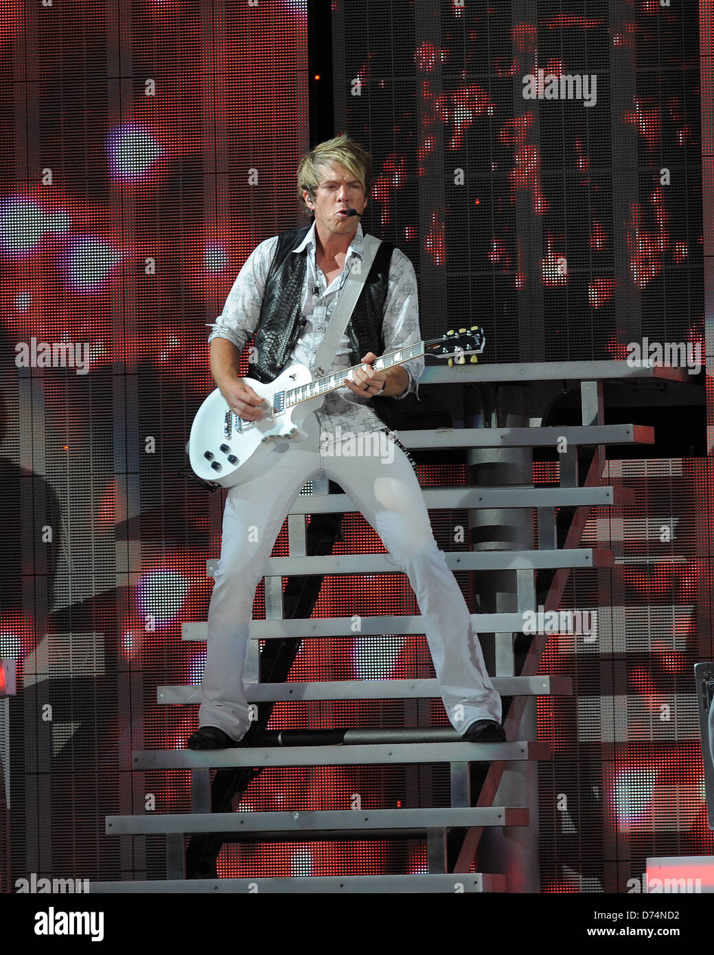 Joe Don Rooney of Rascal Flatts performs at the Cruzan Amphitheater ...