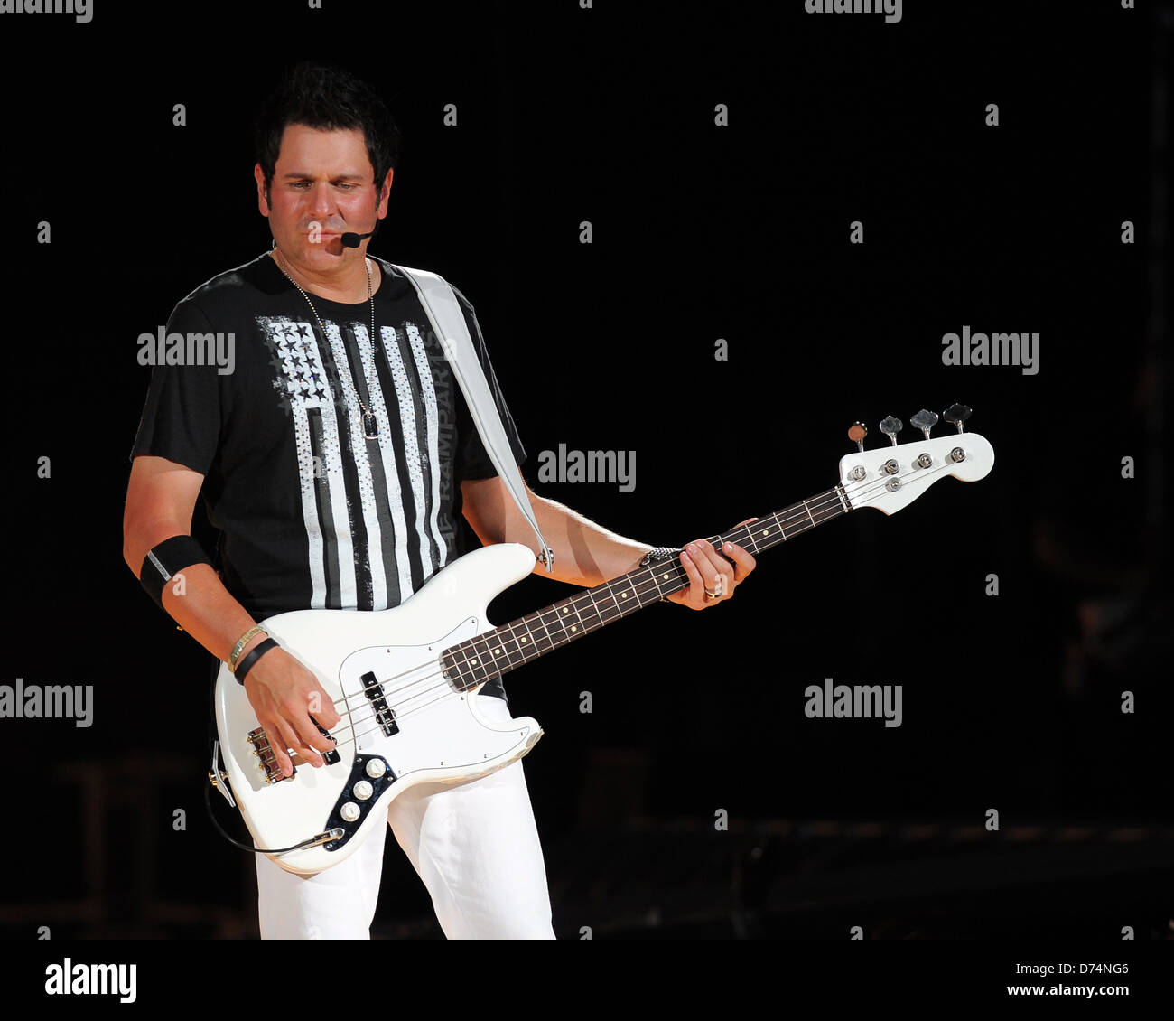 Jay DeMarcus of Rascal Flatts performs at the Cruzan Amphitheater West ...