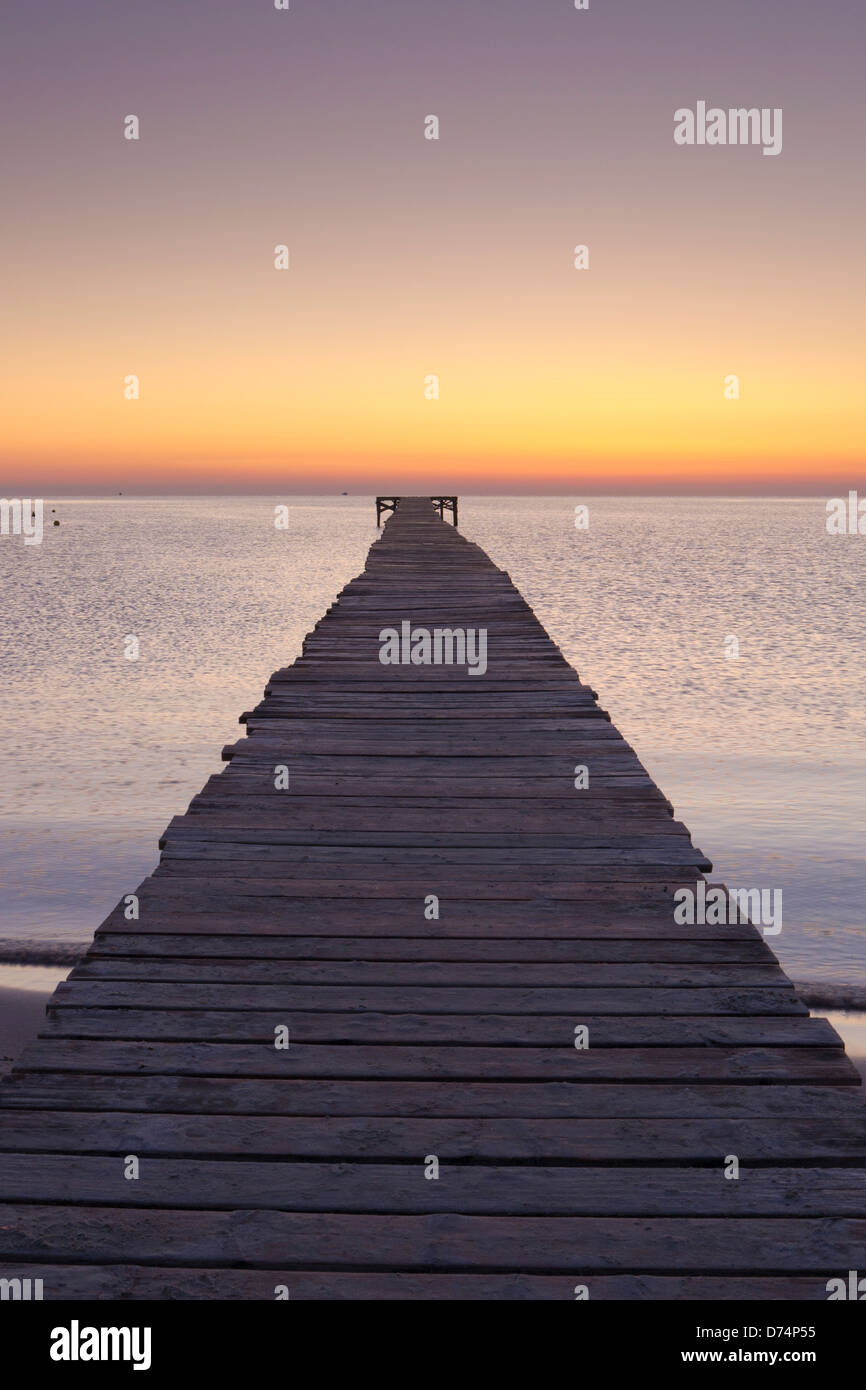Wooden Jetty leading out into the bay, Alcudia, Mallorca, Spain Stock ...