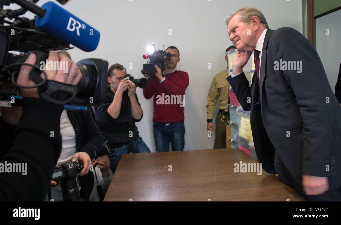 President of the Higher Regional Court, Karl Huber (R), stands in front ...