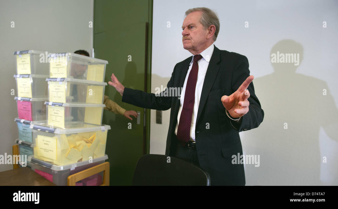 President of the Higher Regional Court, Karl Huber, stands next to ...