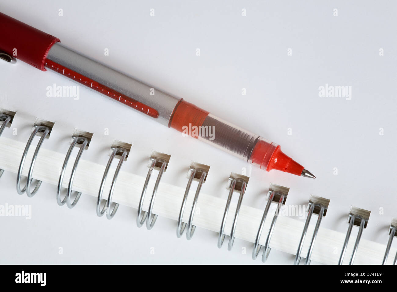 Notepad with pencil Stock Photo - Alamy