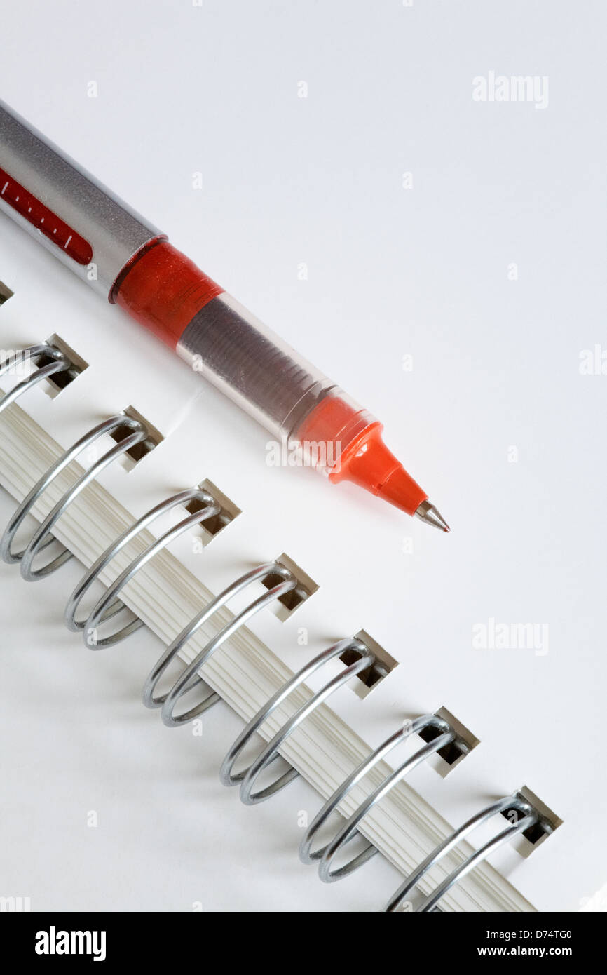 Notepad with pencil Stock Photo - Alamy