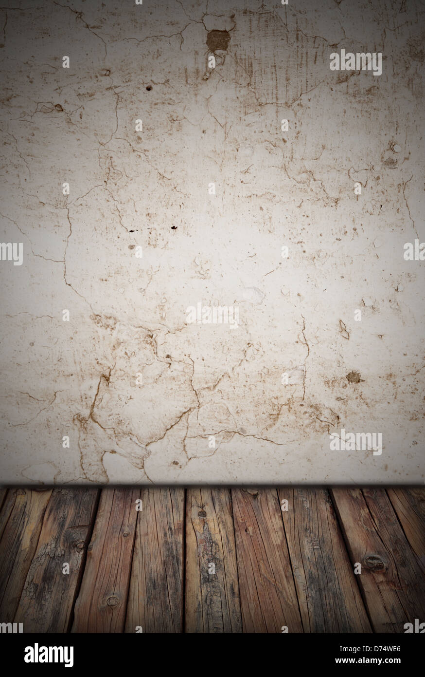 a dirty room with a wooden floor Stock Photo - Alamy
