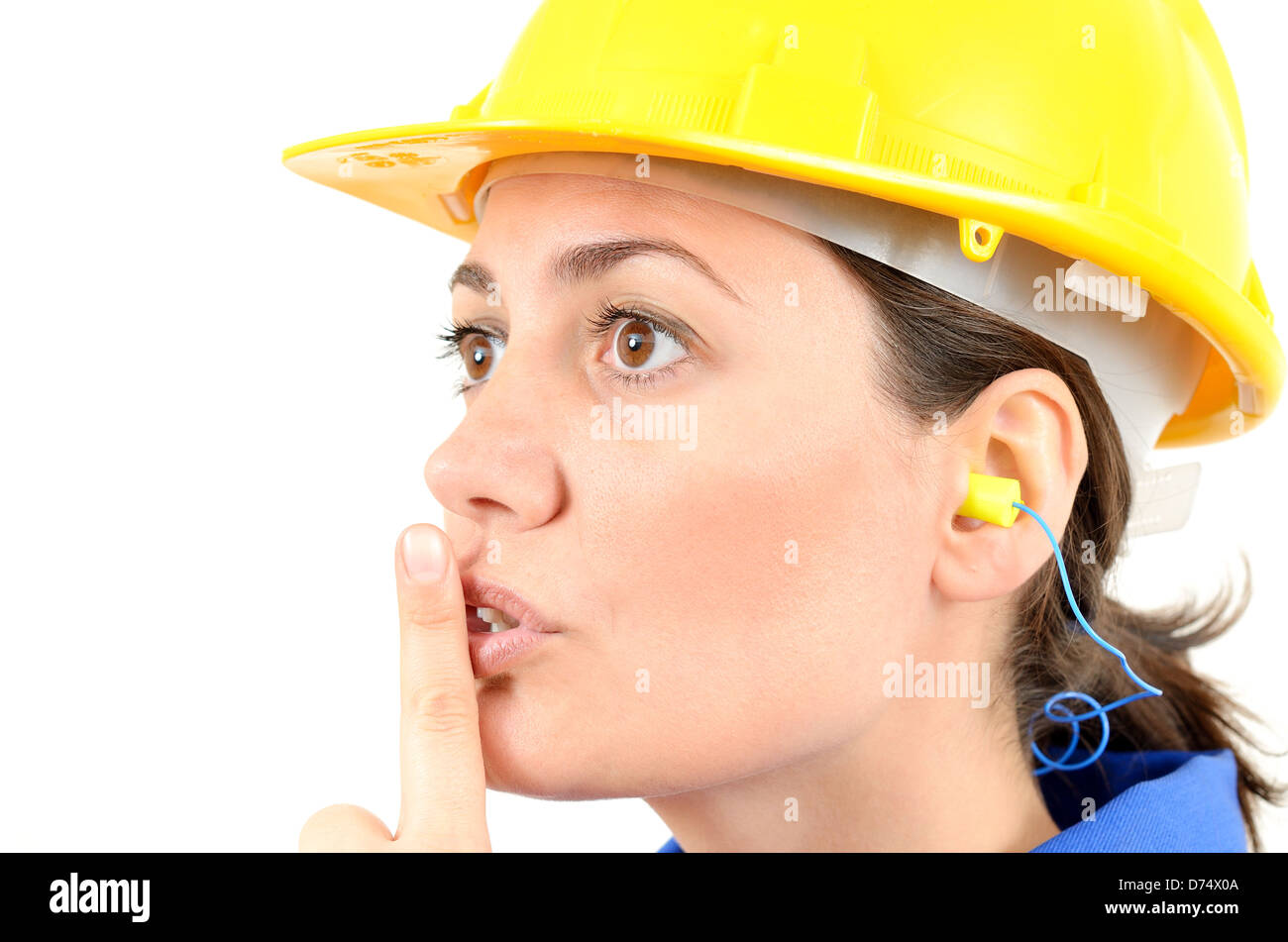 Woman wearing ear plugs hi-res stock photography and images - Alamy