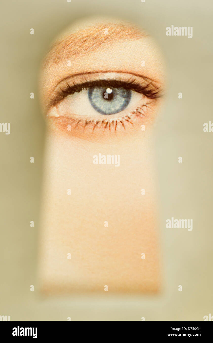 woman's eye looking through keyhole Stock Photo - Alamy