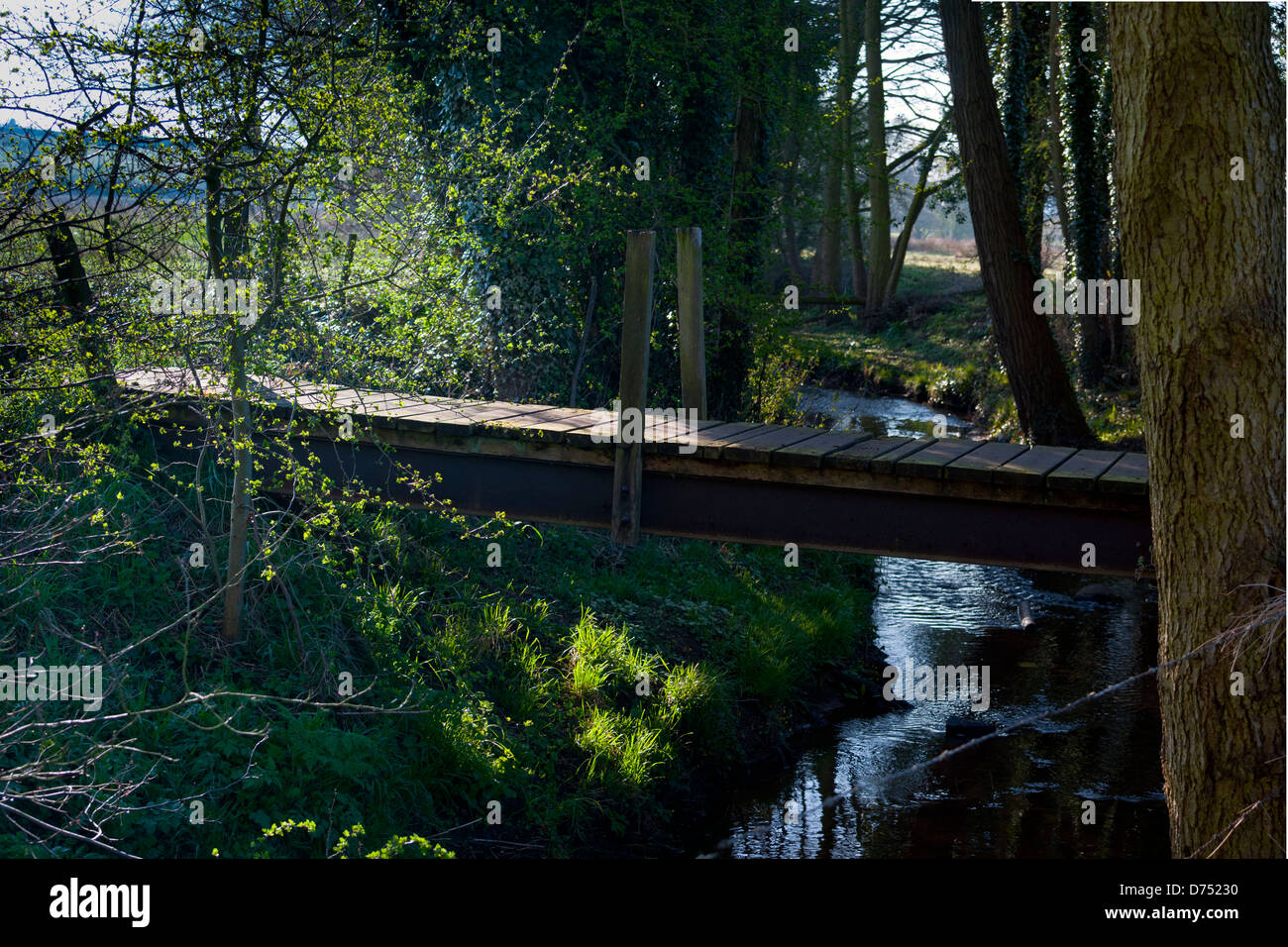footbridge over stream moat brook on the Staffordshire way Stock Photo ...
