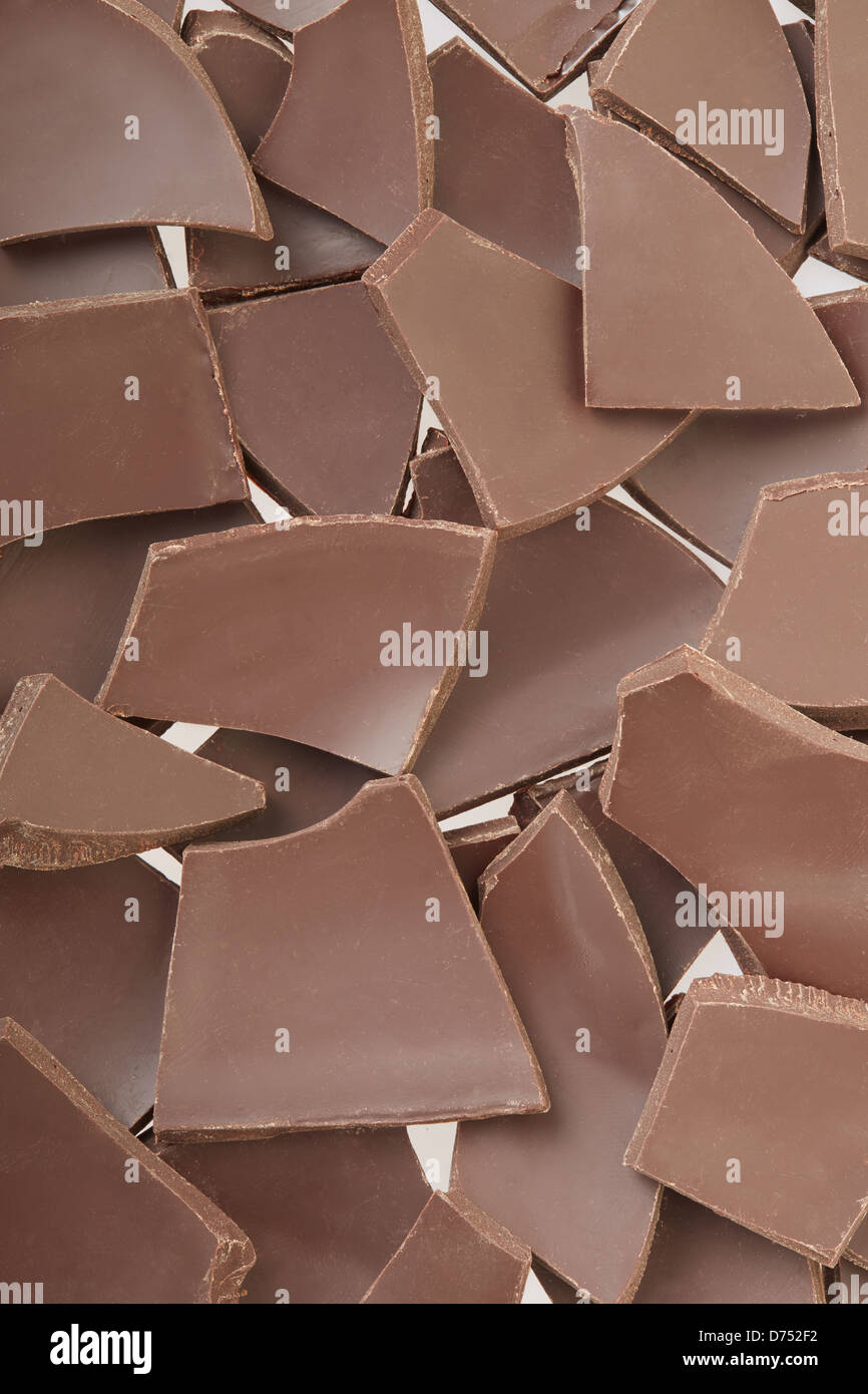 Chocolate pieces or chips texture background Stock Photo - Alamy