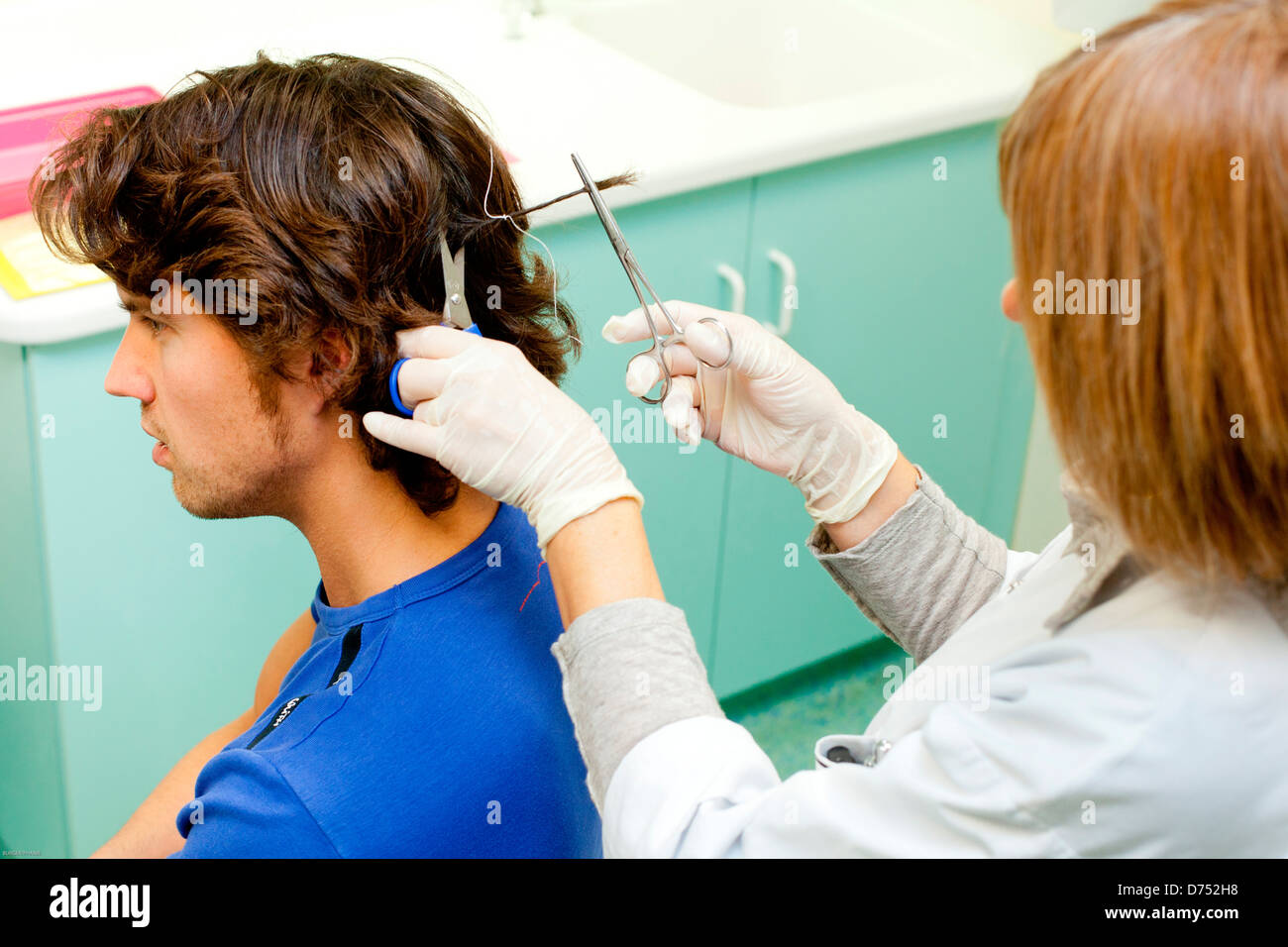 Taking a hair sample for toxicological analysis Stock Photo - Alamy