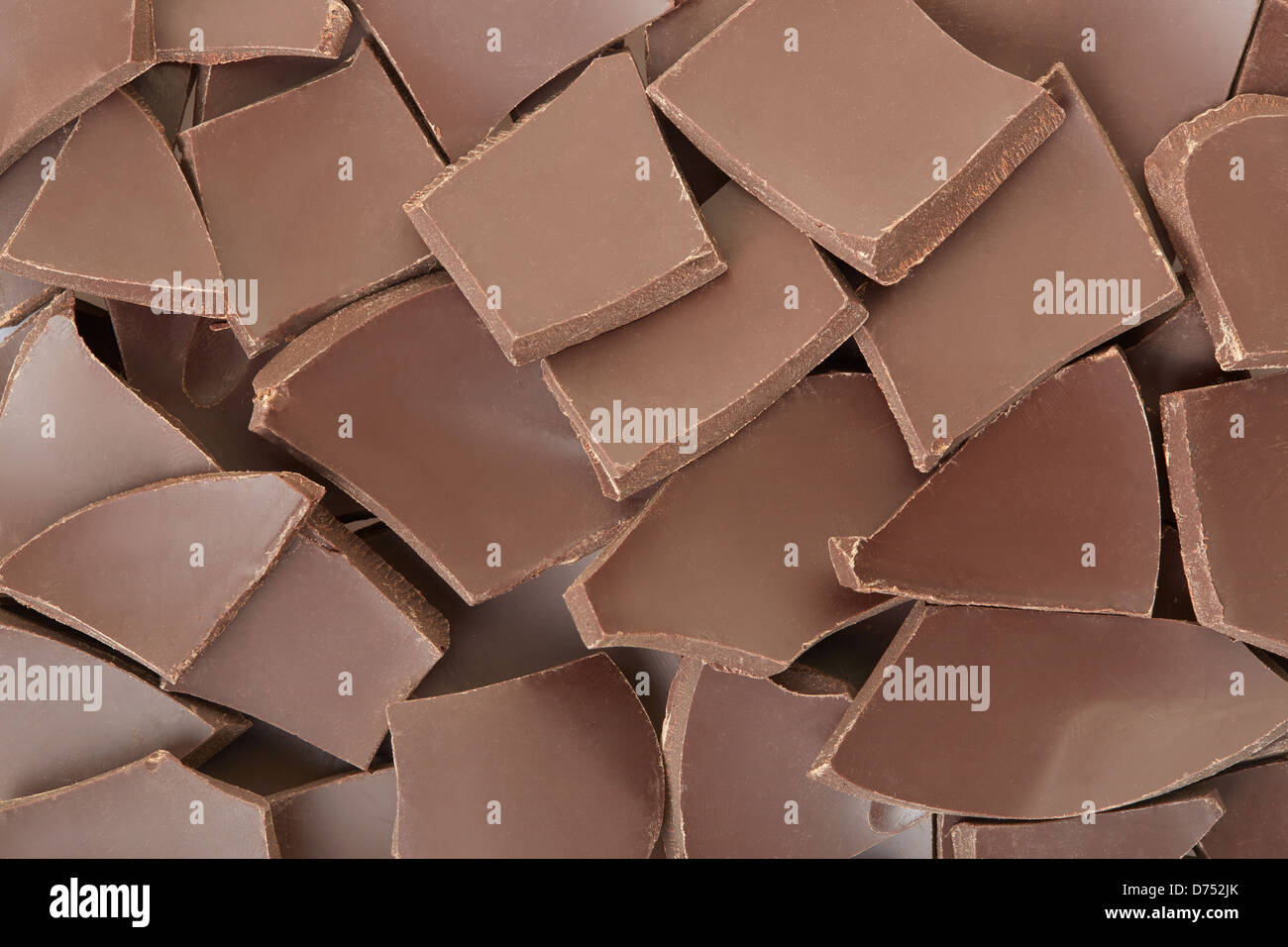 Chocolate pieces or chips texture background Stock Photo - Alamy