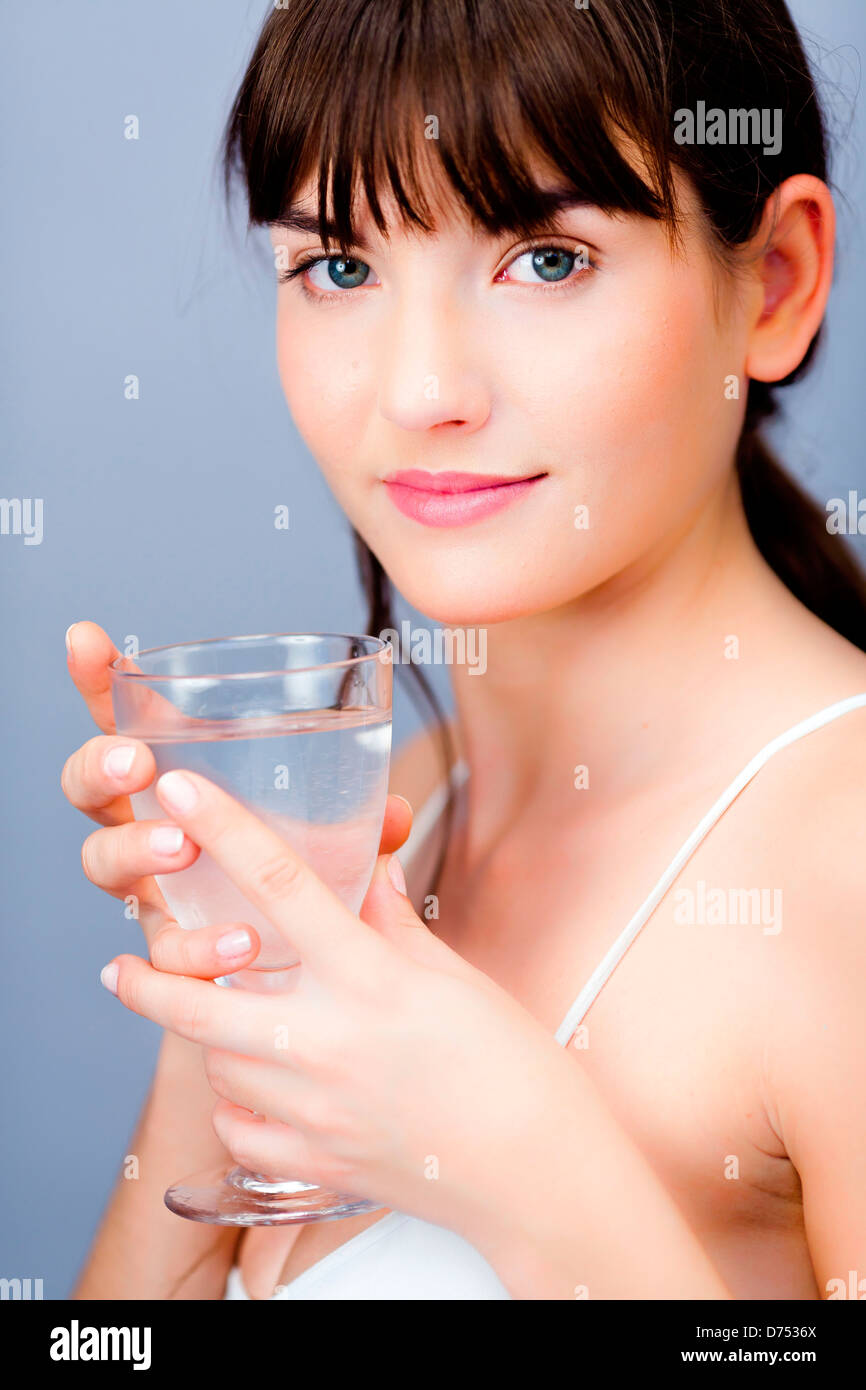woman drinking mineral gas water Stock Photo - Alamy