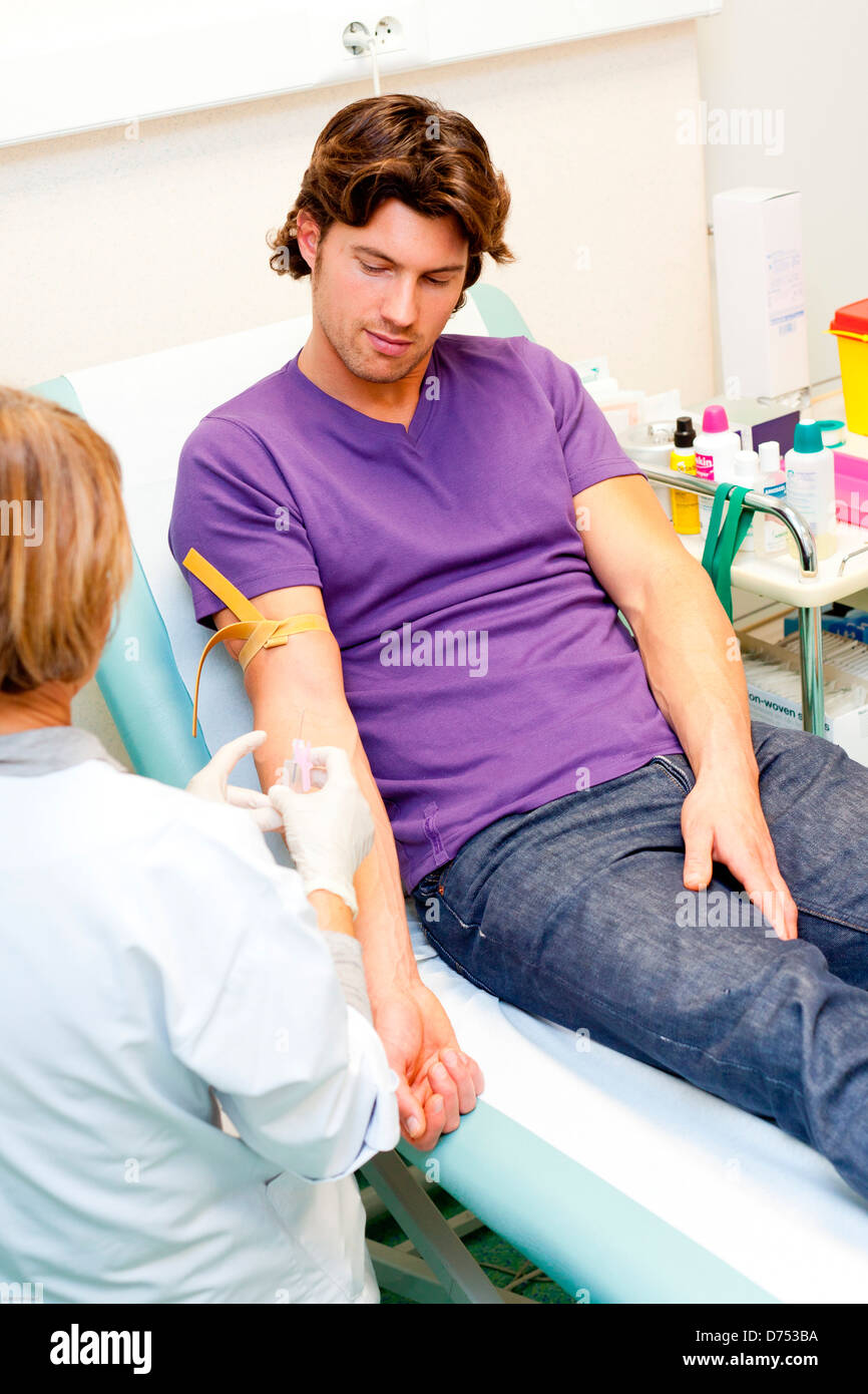 Man having a blood sample Stock Photo - Alamy