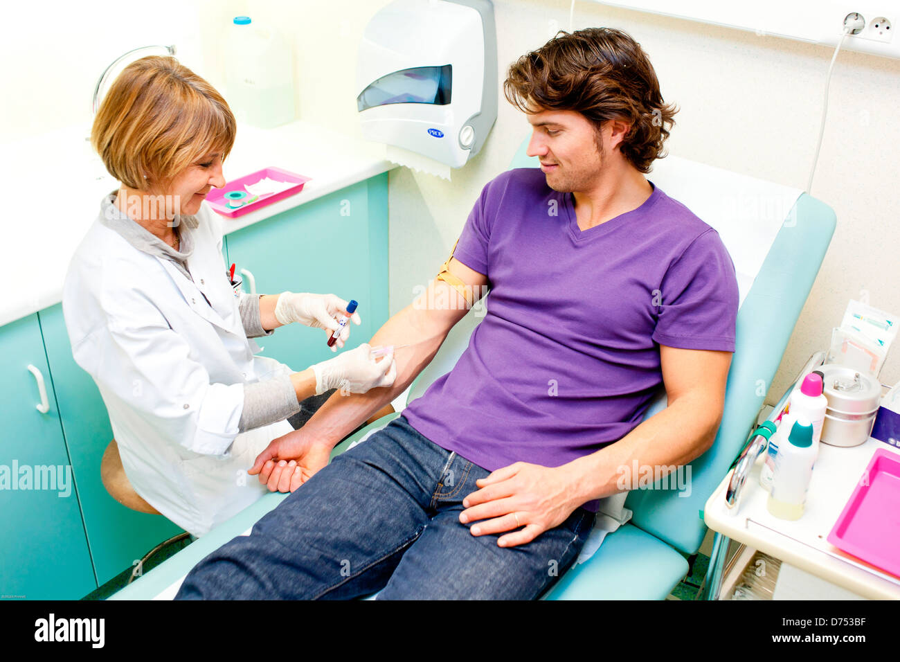Man having a blood sample Stock Photo - Alamy