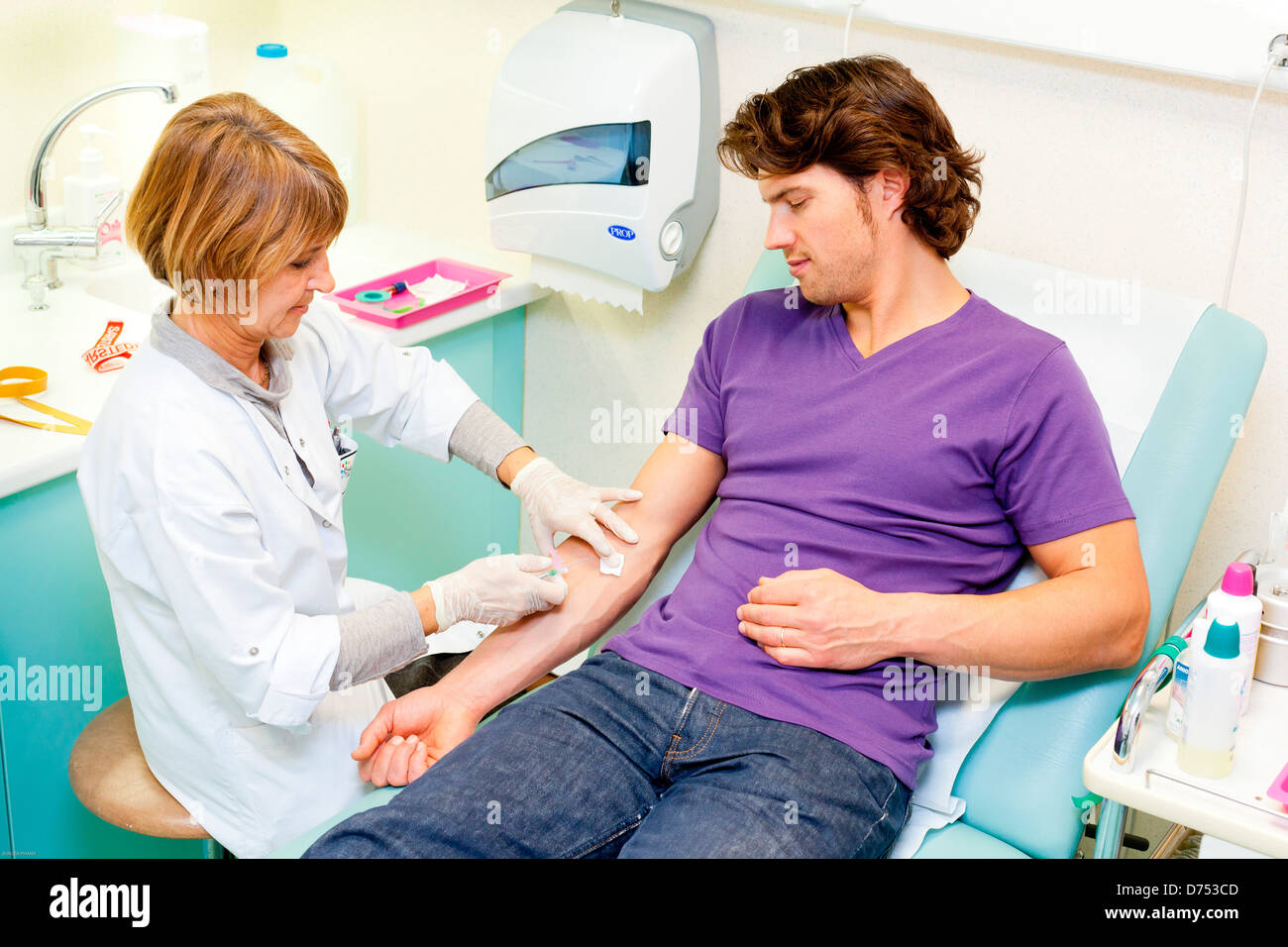 Man having a blood sample Stock Photo - Alamy