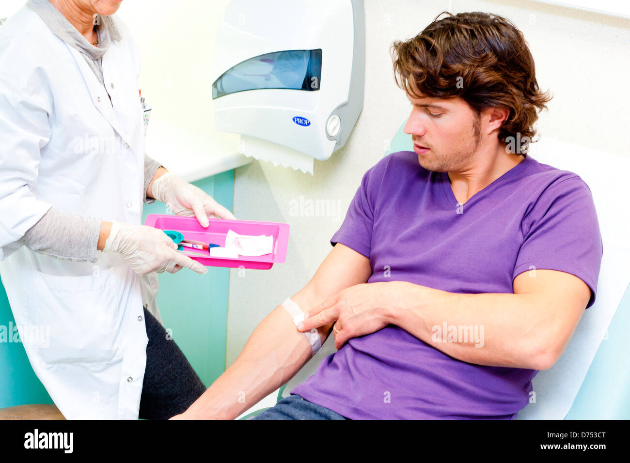Man having a blood sample Stock Photo - Alamy
