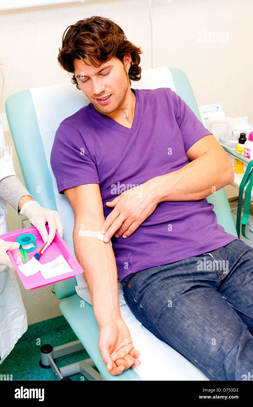 Man having a blood sample Stock Photo - Alamy