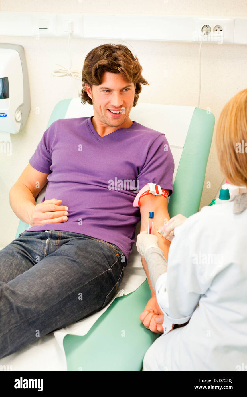 Blood test man having hi-res stock photography and images - Alamy