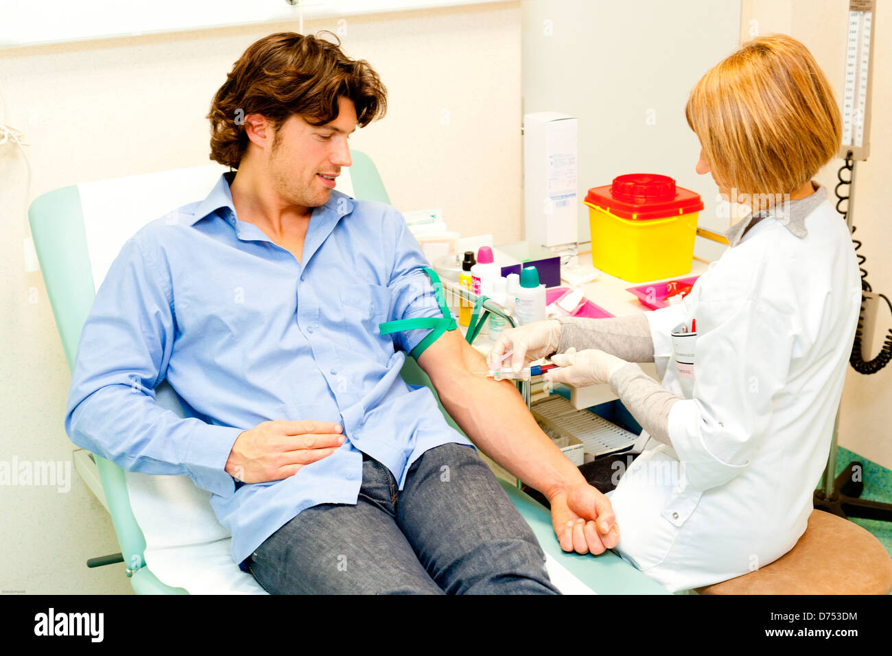 Man having a blood sample Stock Photo - Alamy