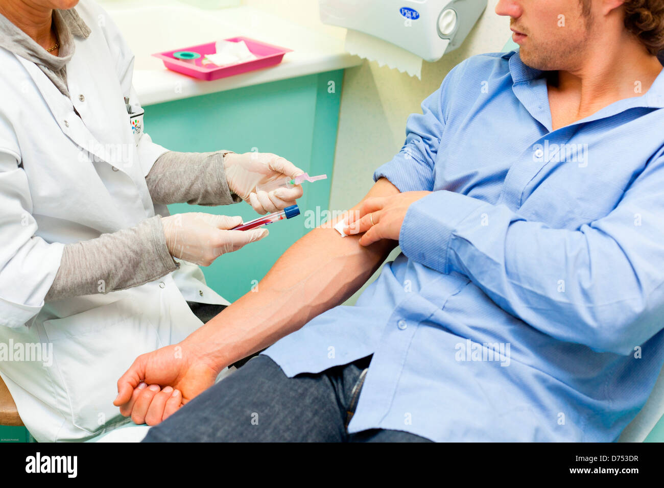Man having a blood sample Stock Photo - Alamy