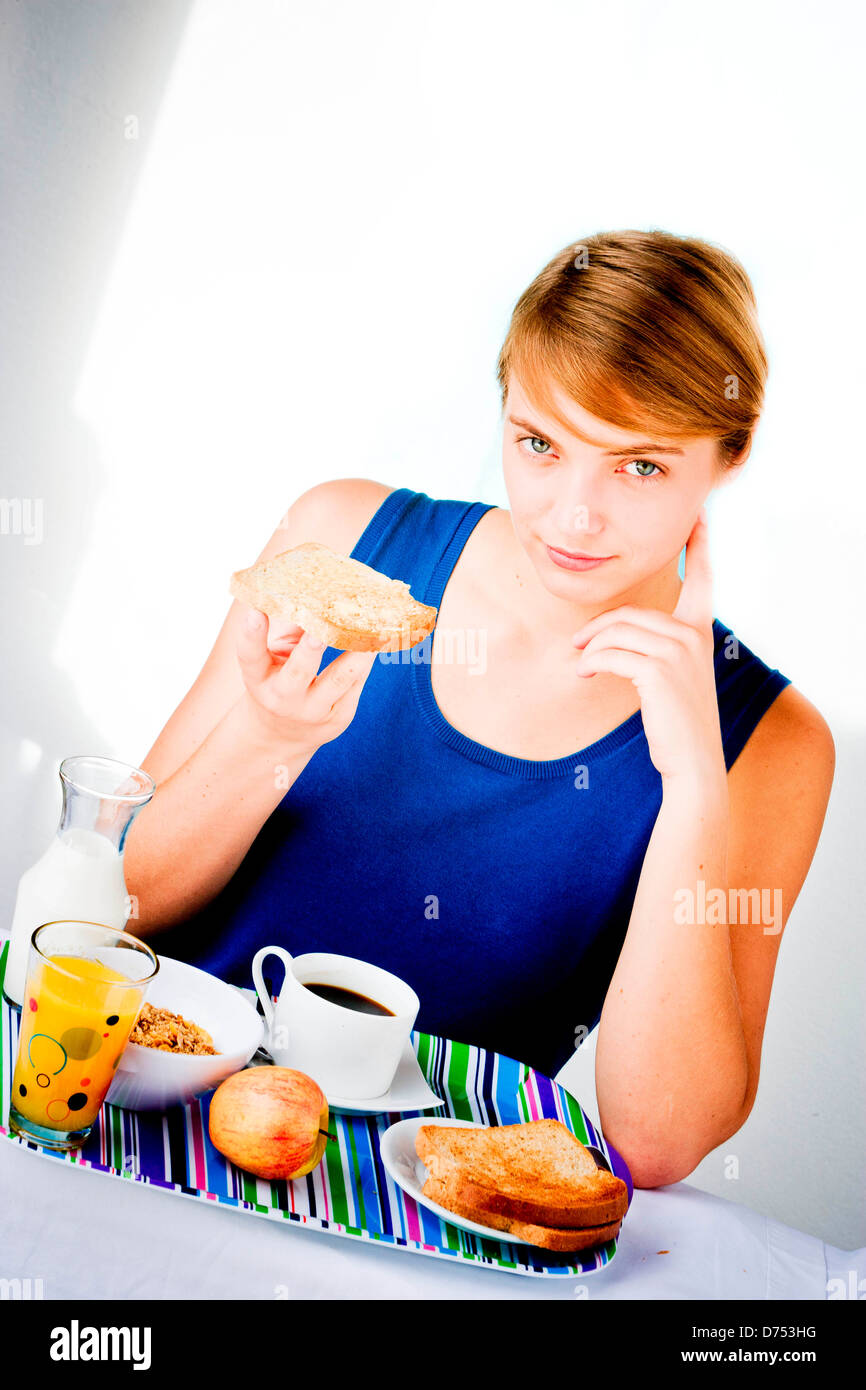 woman having breakfast Stock Photo - Alamy
