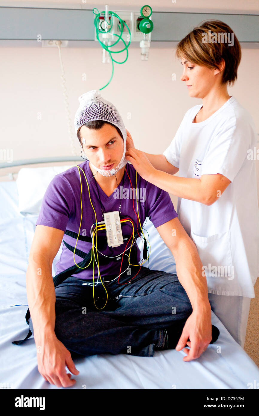Man undergoing polysomnographic examination polysomnography study ...