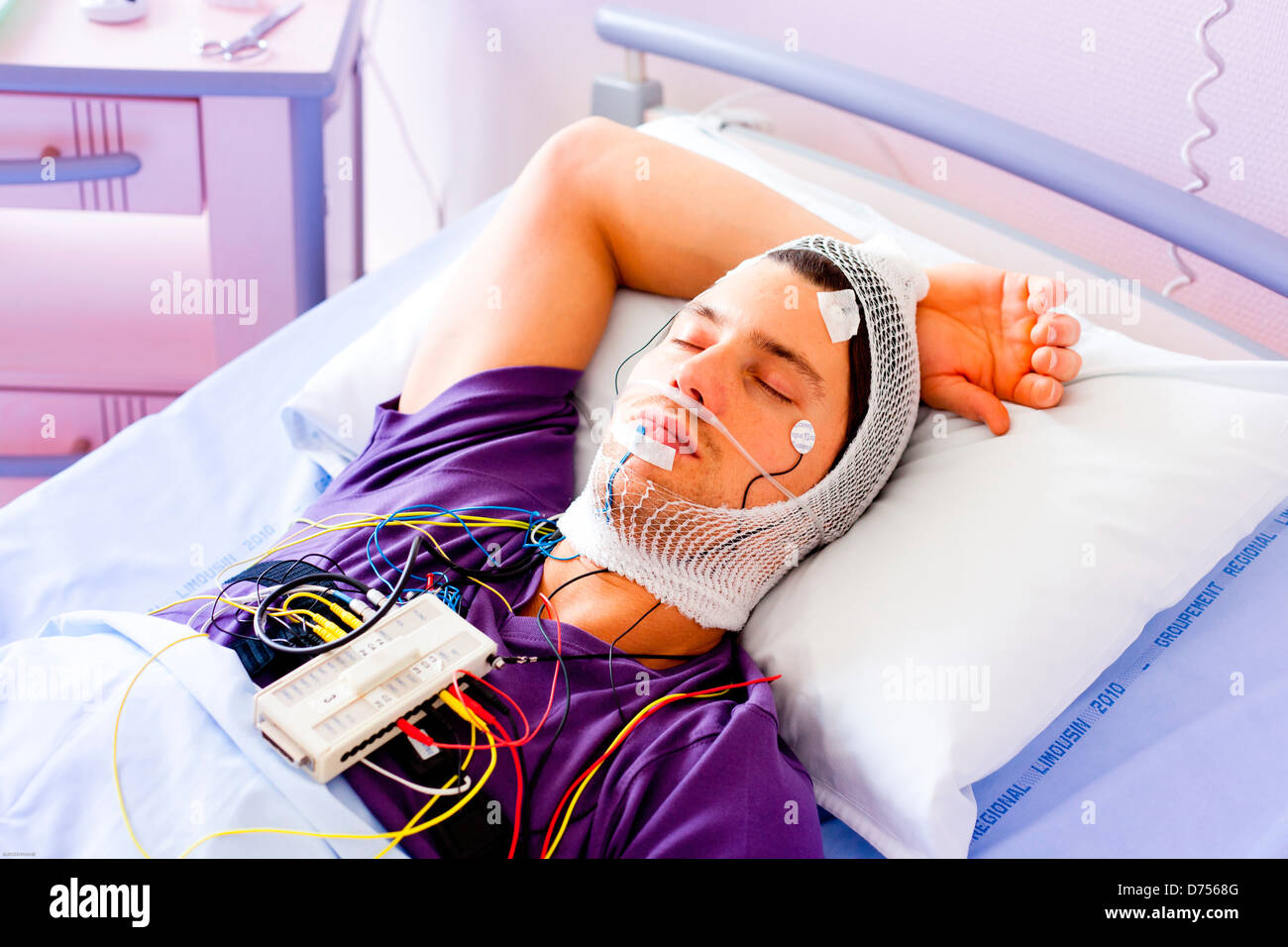 Man undergoing polysomnographic examination polysomnography study ...