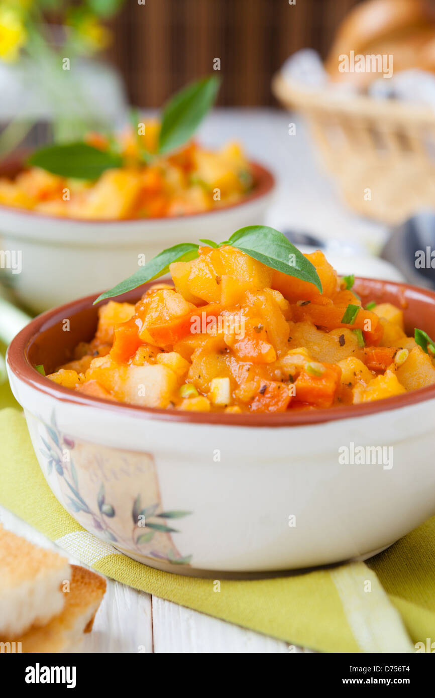 potato stew with carrots and greens, closeup food Stock Photo - Alamy