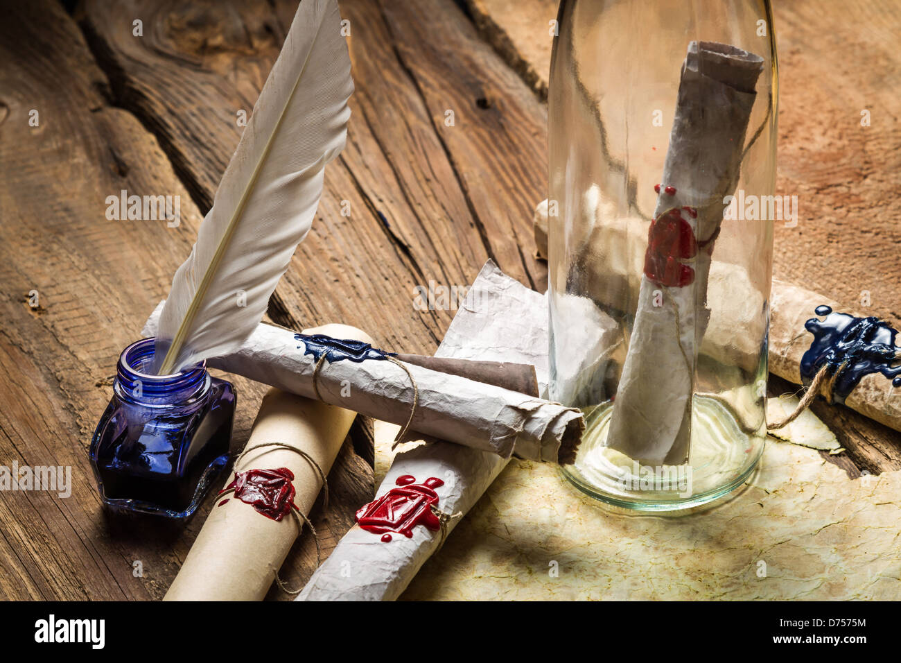 Preparing to send ancient letter in a bottle Stock Photo - Alamy
