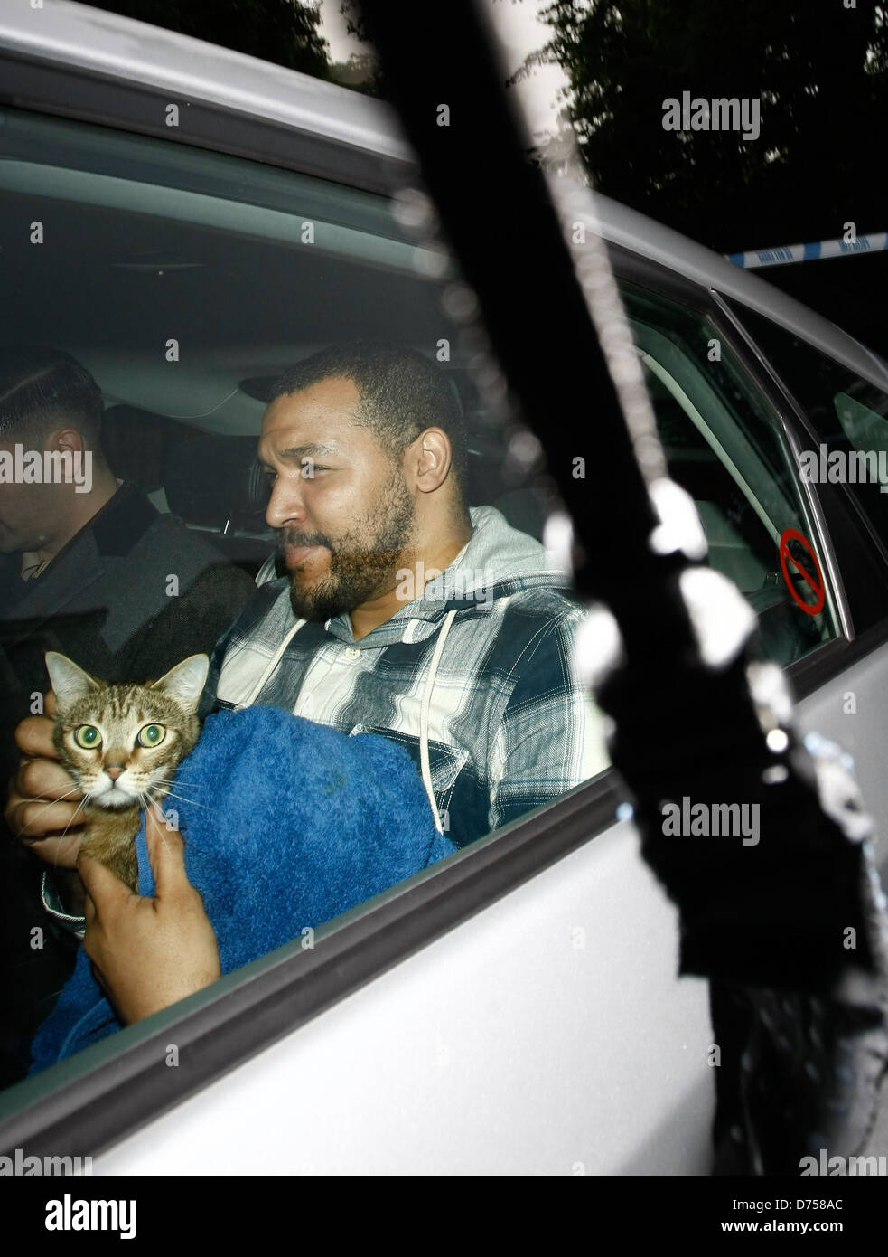 Reg Traviss is seen departing after being outside Amy Winehouse's home ...